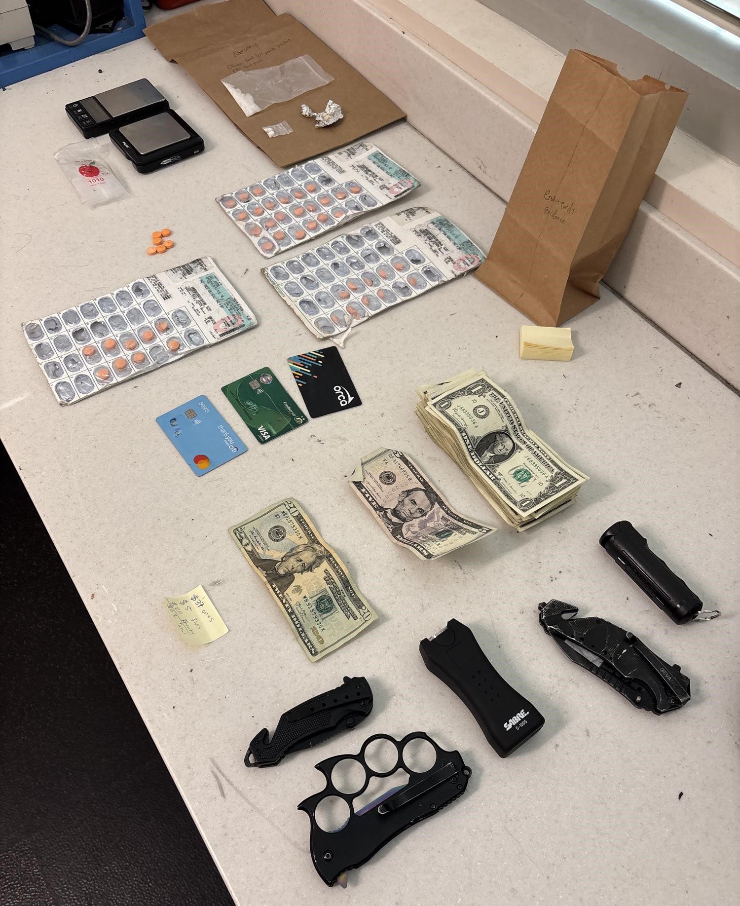 Cops Recover Crystal Meth, Brass Knuckles, Knives, and Cash During U ...